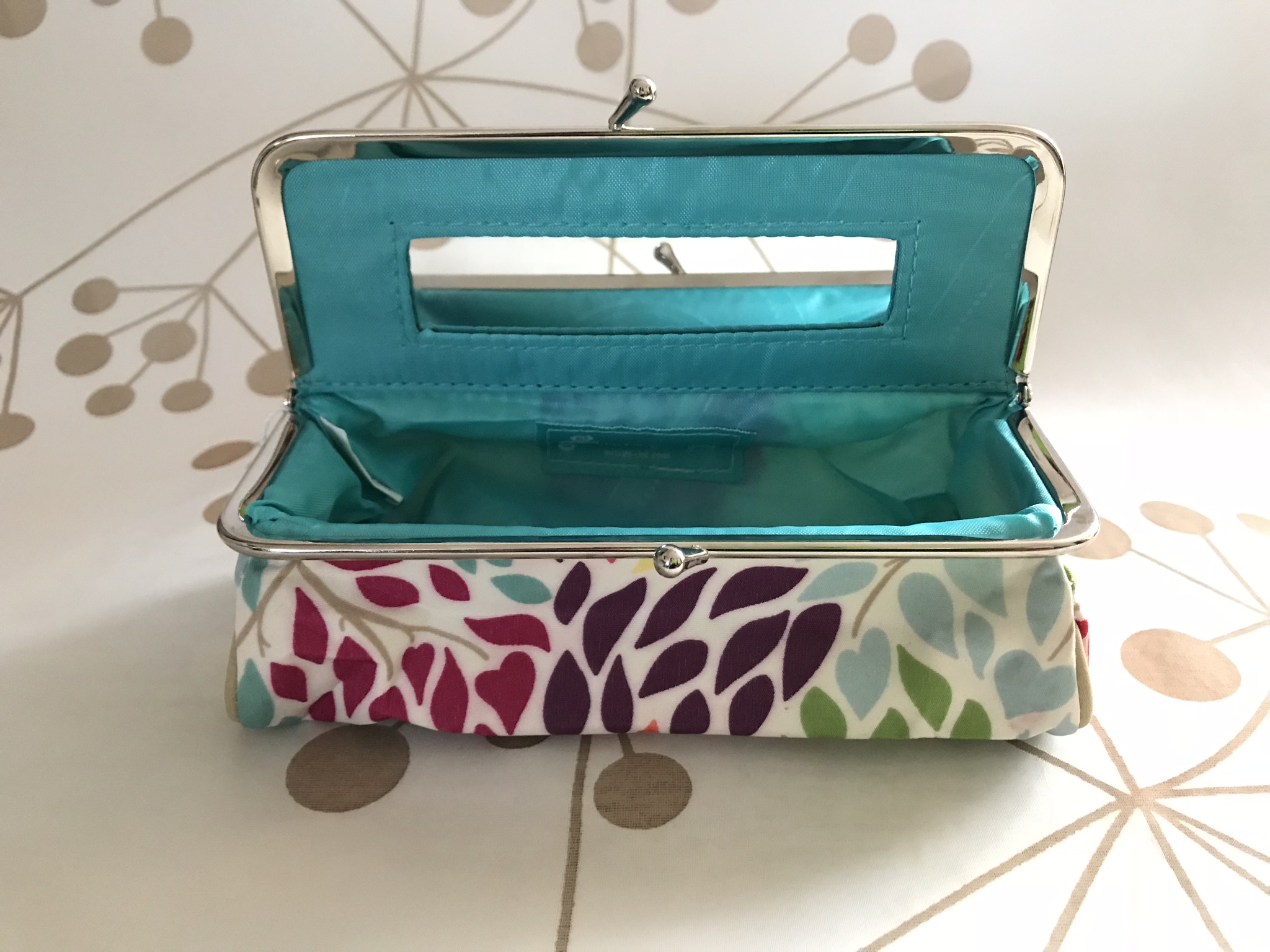 sanasta Just In Case compact case with kiss-lock closure and mirror